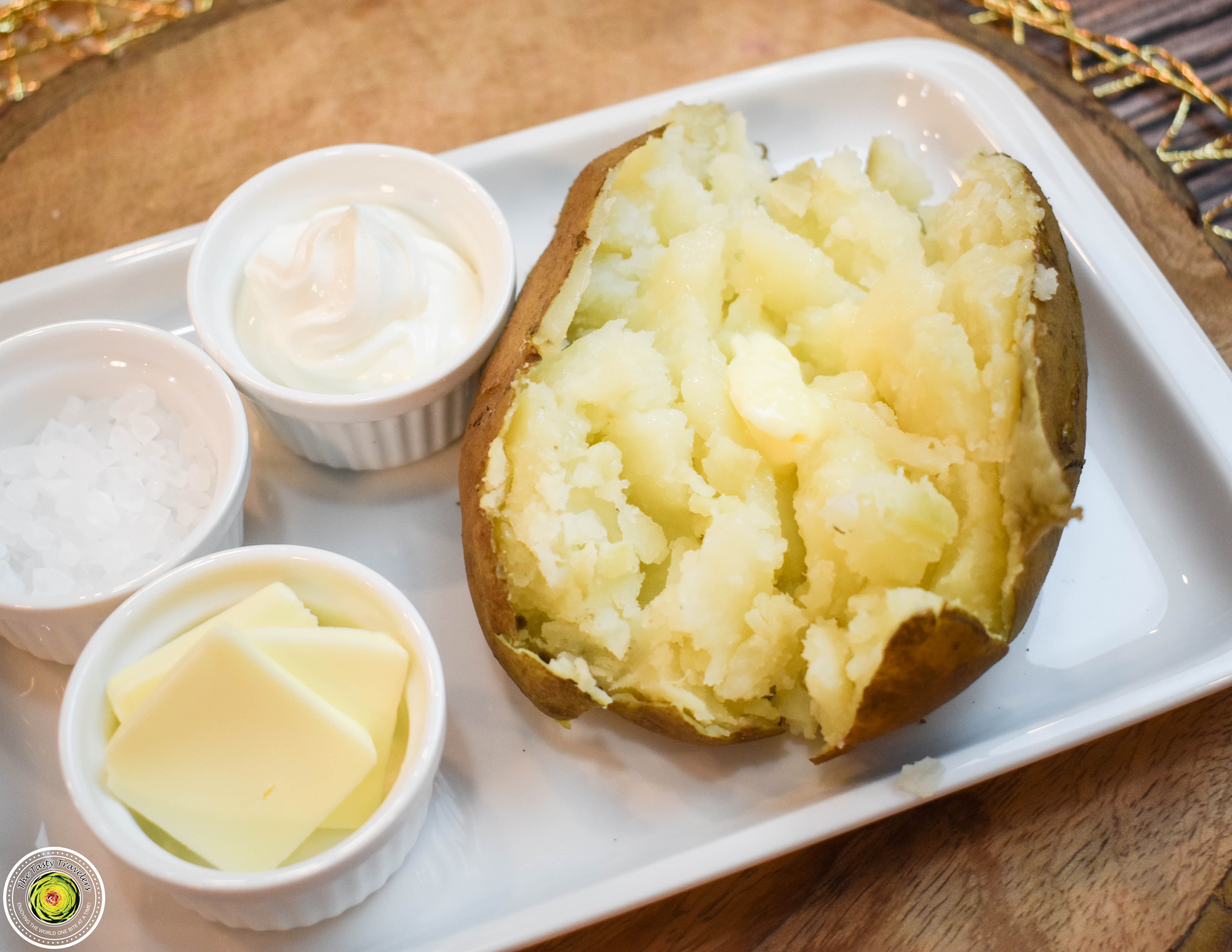 Ninja Foodi Baked Potatoes - The Tasty Travelers
